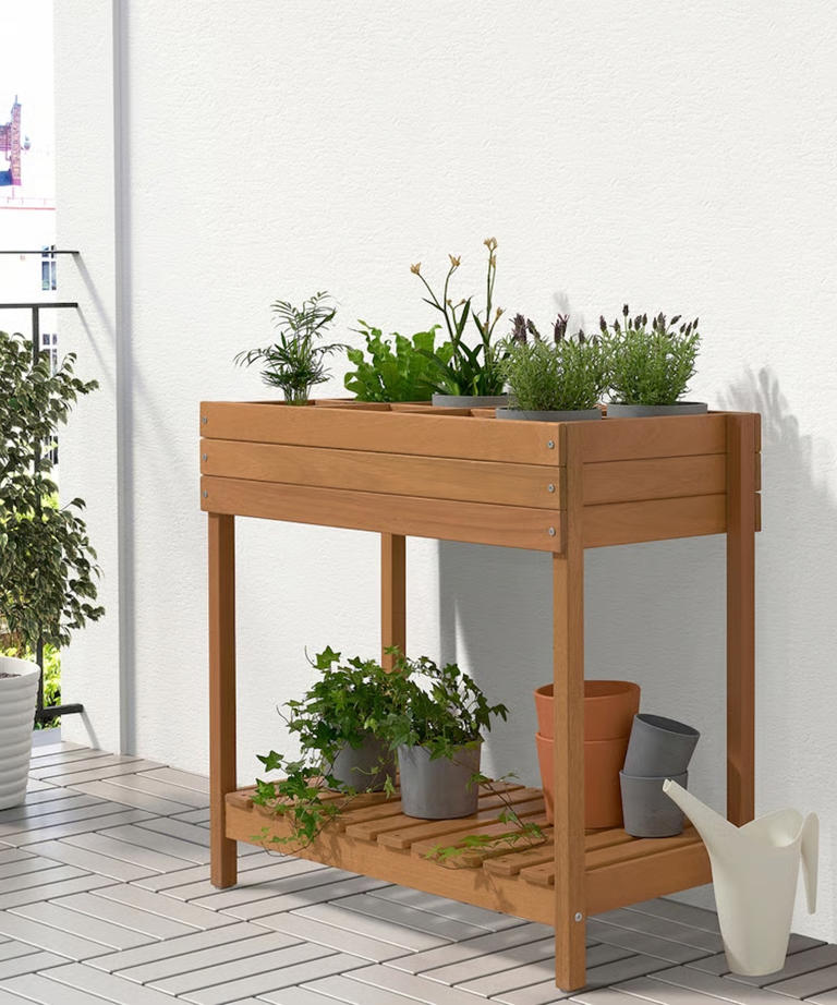 This stylish IKEA plant stand doubles as a raised bed planter