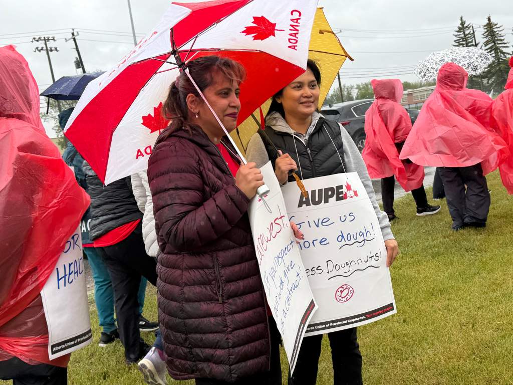 Alberta health-care workers rally in Calgary for better job conditions