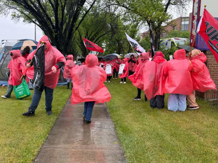 Alberta health-care workers rally in Calgary for better job conditions