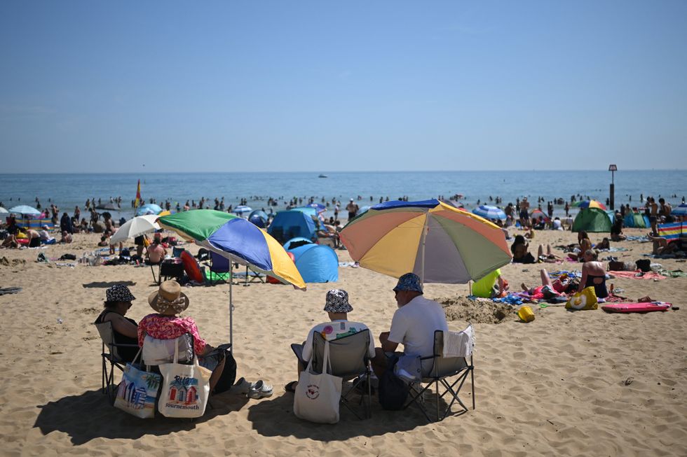England and Wales swelter in hottest ever spring since records began