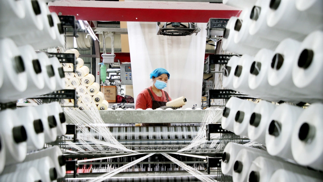 China's private factory gauge beats forecasts as official PMI stalls
