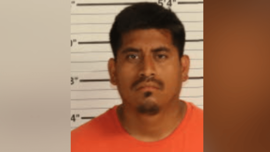 Man accused of choking a woman, punching guard member