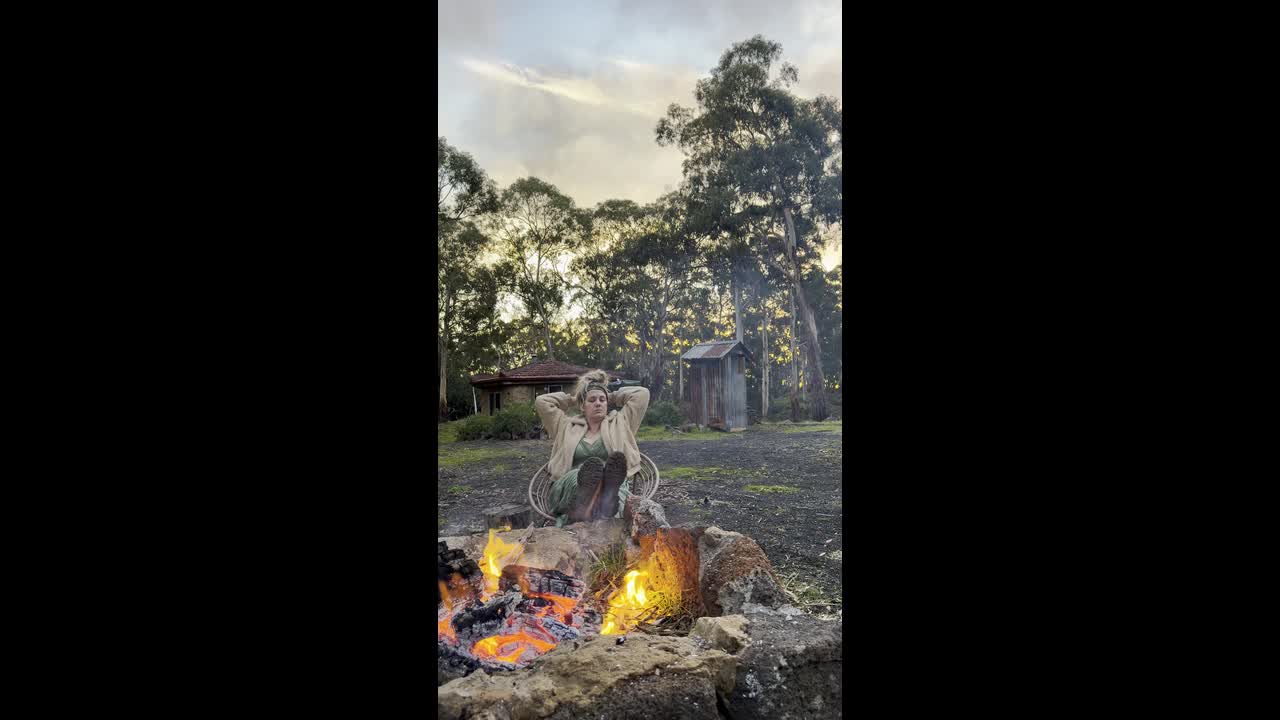 Campfire calm turns chaotic as chair leg sinks and sends creator tumbling