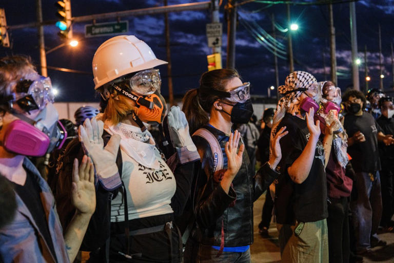 Inside the well-stocked anti-ICE coalition tent raided by feds outside ...