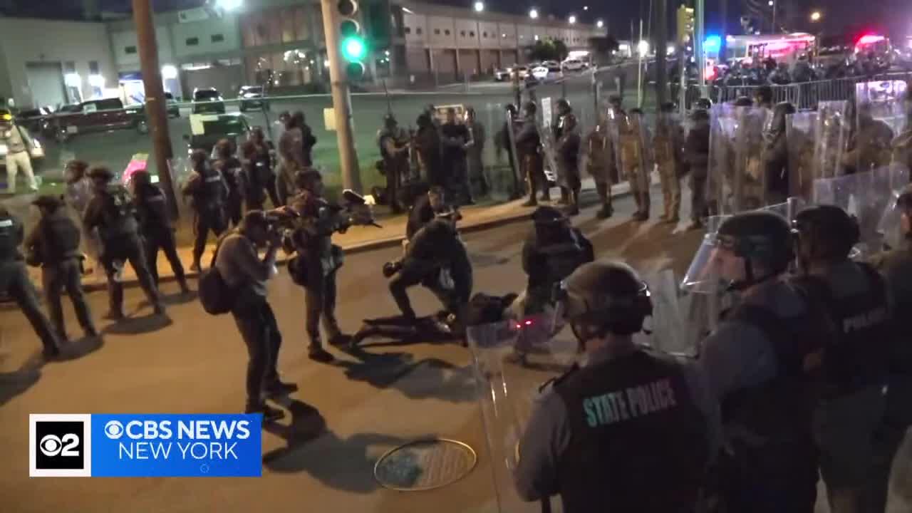 Protesters and police at Delaney Hall immigration detention center in ...