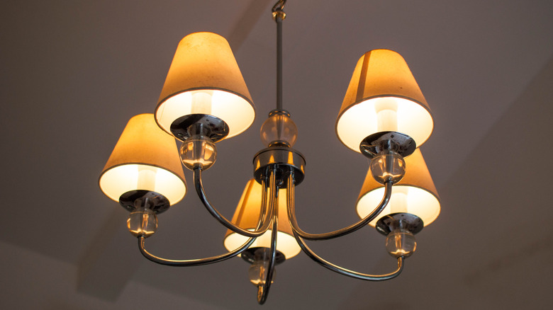 15 gorgeous ideas for repurposing old light fixtures in your home and yard
