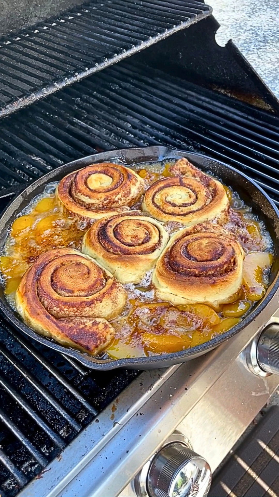 Grilled peach cinnamon roll dessert