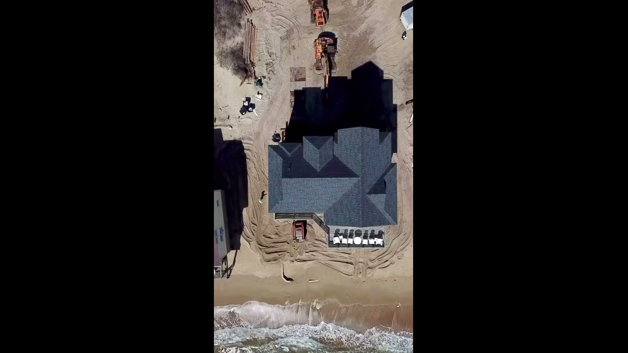 Watch beachfront home get hauled away from rising shoreline