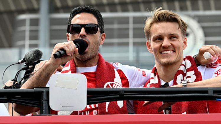 Watch: Arsenal star Martin Ødegaard's parade header goes wrong; lands ...