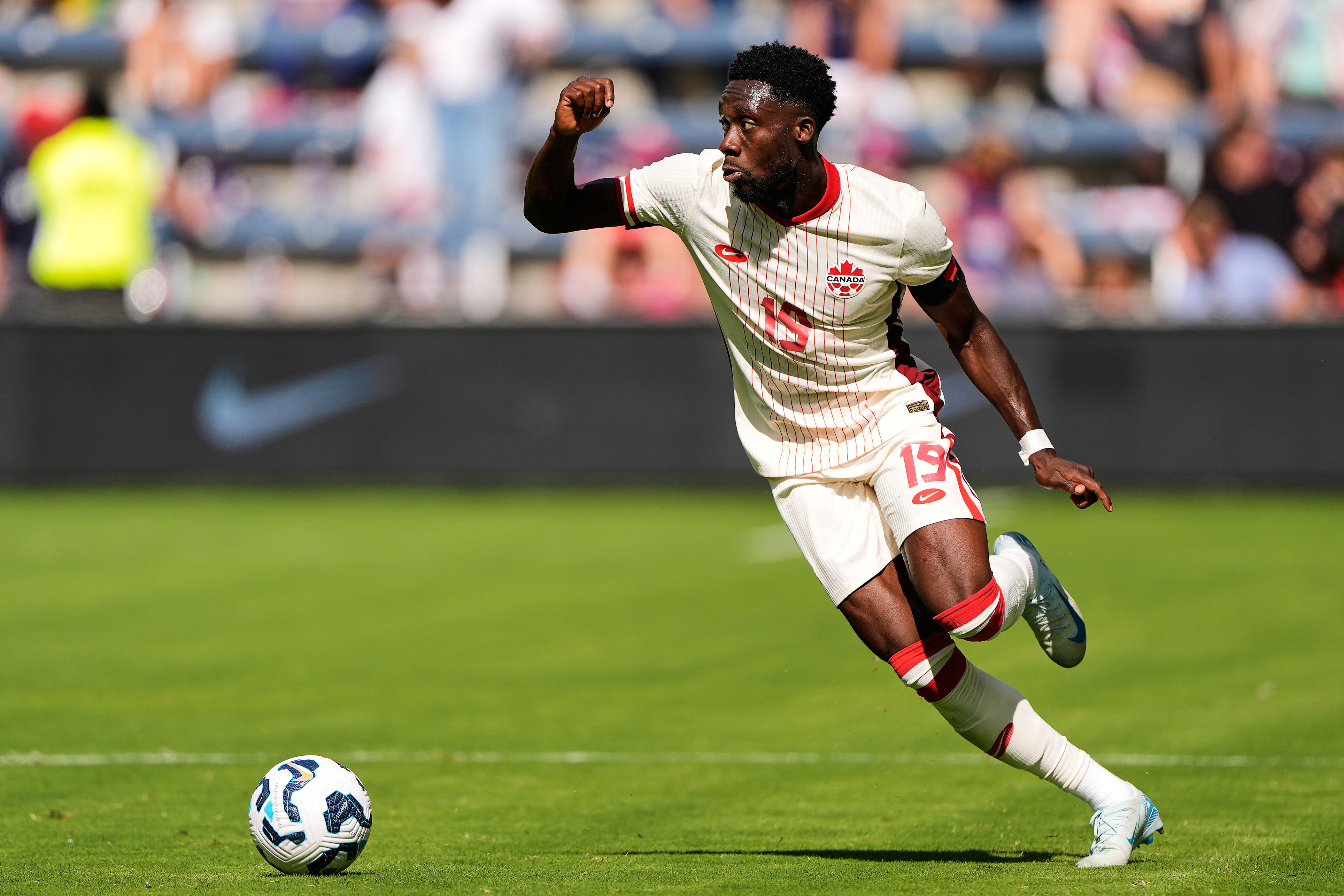 Injured Canada captain Alphonso Davies rejoins team but it's not clear ...