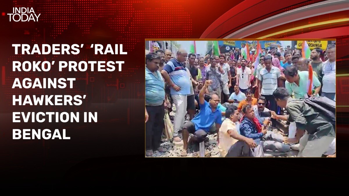 Video: Bengal hawkers block tracks, stage rail roko protest against ...