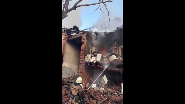 Ukrainian building in ruins as Russian attack on Dnipro kills four ...
