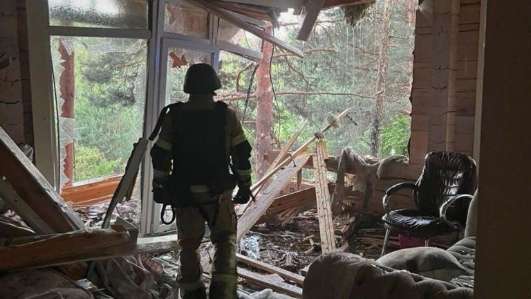 Kyiv hit by deadly Russian strikes, people feared trapped in apartment ...