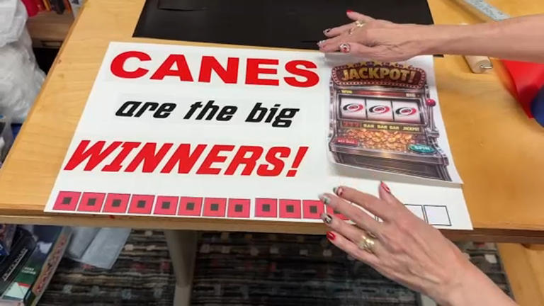 'Sign Lady' brings Canes spirit to every game