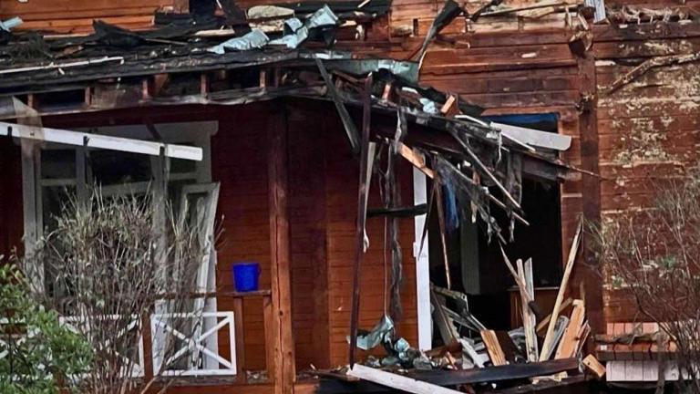 Kyiv hit by deadly Russian strikes, people feared trapped in apartment ...