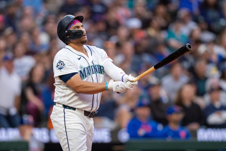 Mariners slugger Josh Naylor leaves game with back spasms after hitting ...