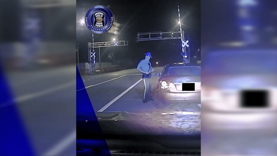 Impaired driver hits Kansas Highway Patrol car, narrowly missing officer