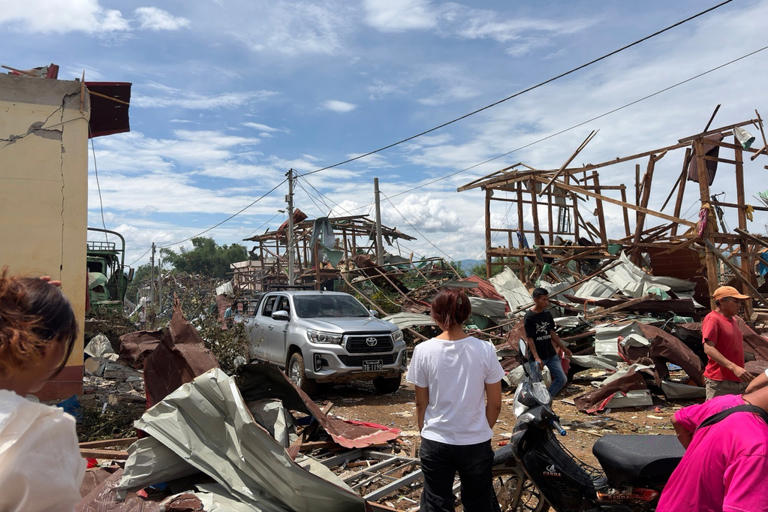 Rescuers dig for bodies after a mining explosives blast in Myanmar ...