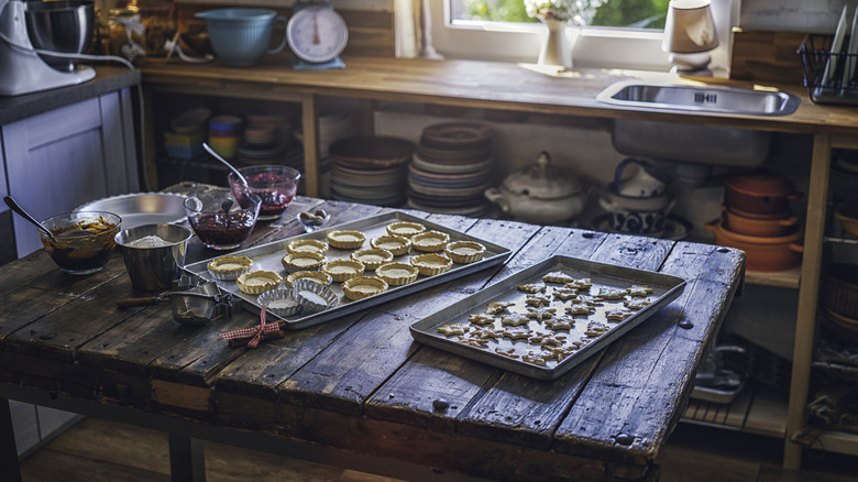 Ditch the overflowing cabinets: A smarter way to store baking sheets in ...