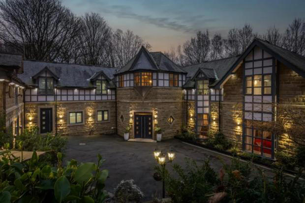 Take a look inside the £1.95m mansion with cinema and steam room