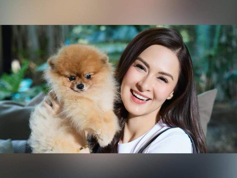 Marian Rivera plays around with a puppy and an Italian designer bag