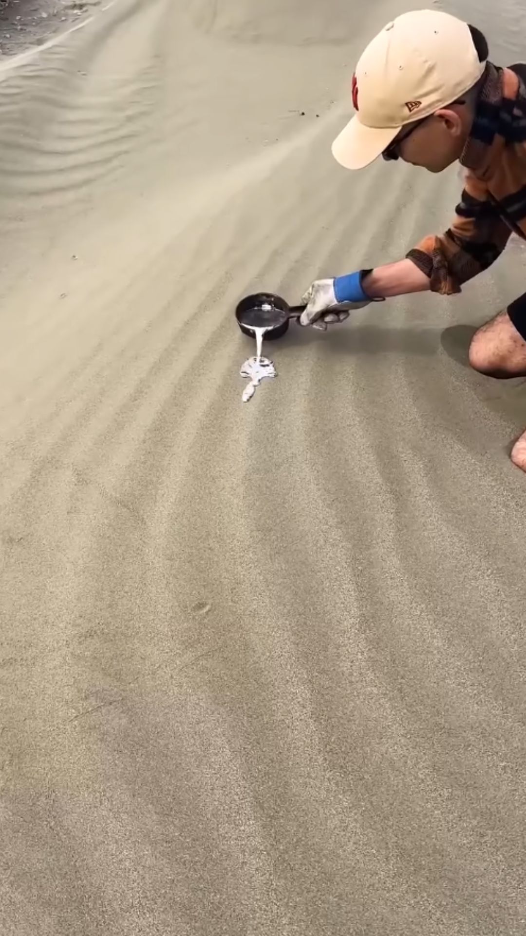 Pouring molten silver over sand dunes creates stunning patterns