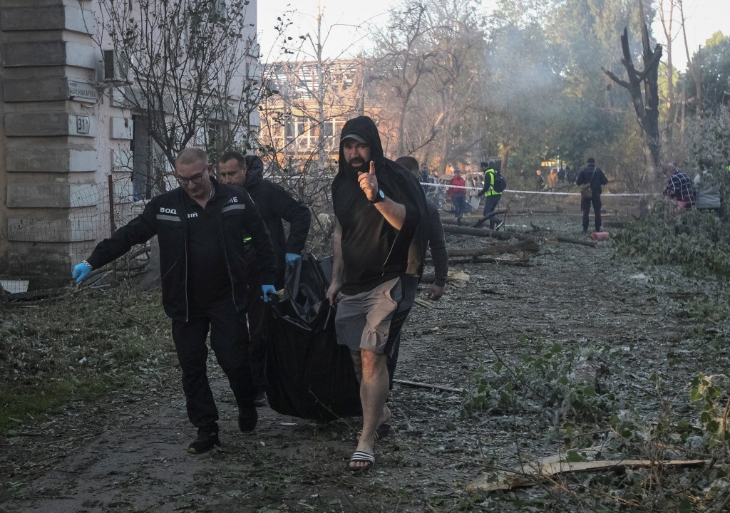 Russian attack on Ukraine kills at least 11 and traps others in damaged ...