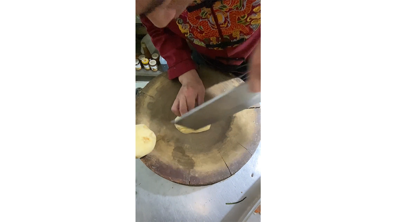 Slicing potato into fine thin strips with precise blade motion and ...