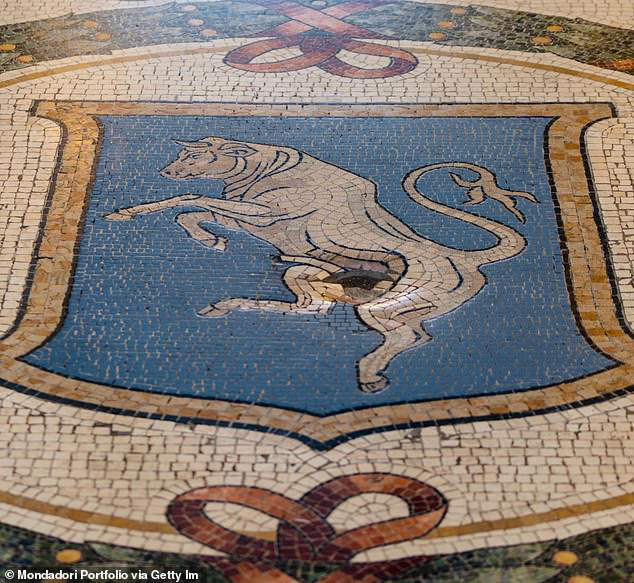Famous bull mosaic gets 'castrated' after tourists kept spinning on its ...