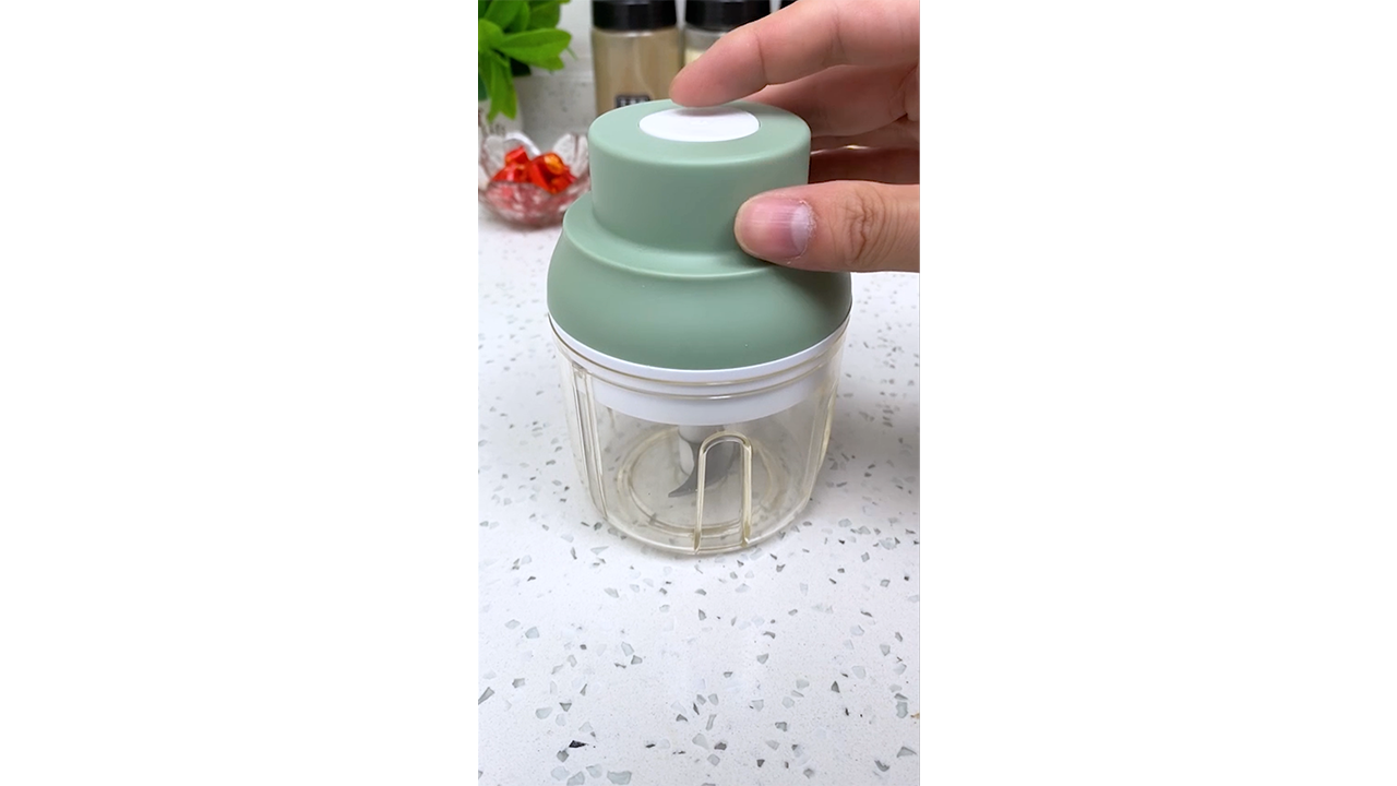 Using mini garlic chopper to create fresh chili garlic mixture ...