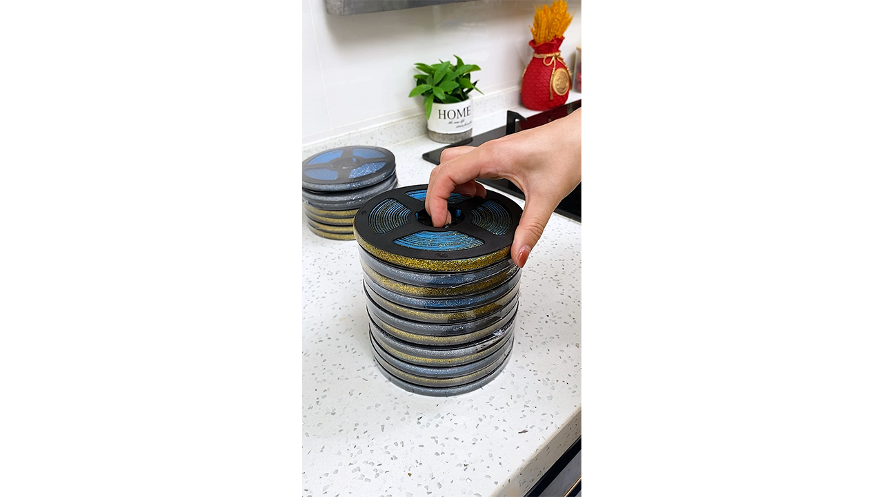 Applying decorative gap sealing tape on kitchen surfaces resulting in ...