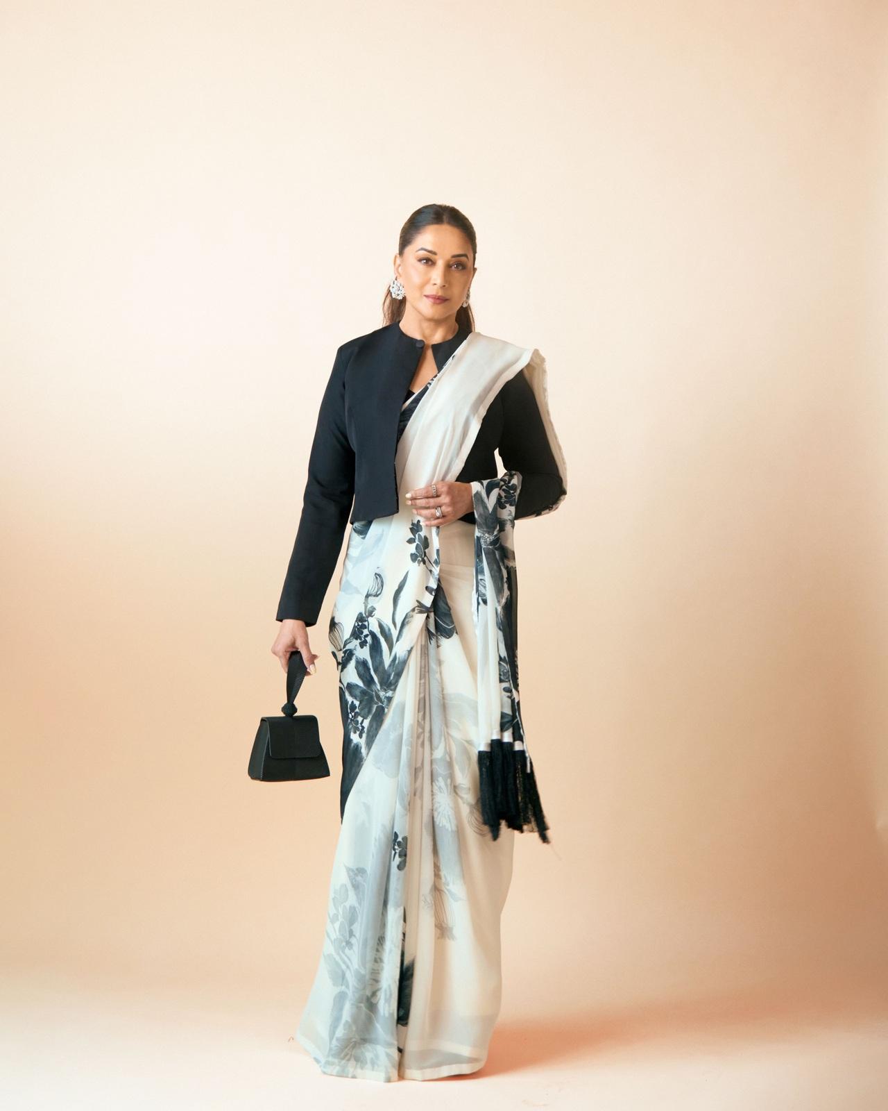 Maa Behen Madhuri Dixit embraces floral magic in breezy promotional looks