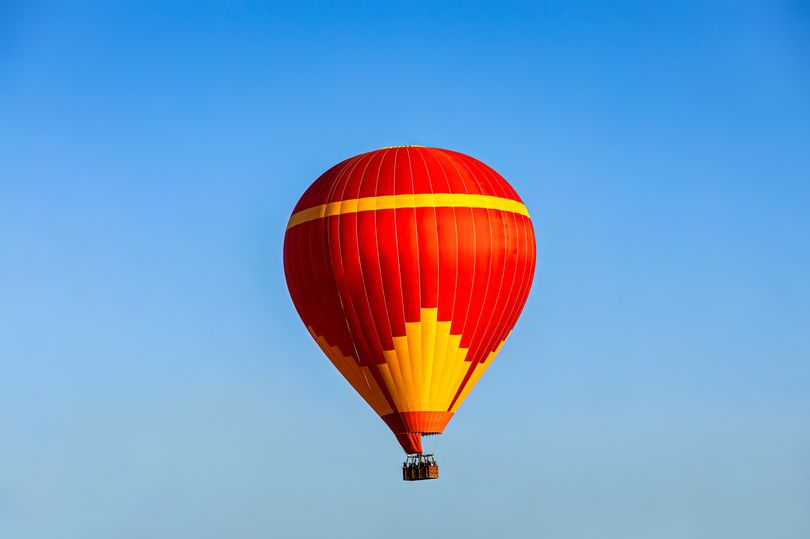 Man dies after jumping from hot air balloon and landing in garden