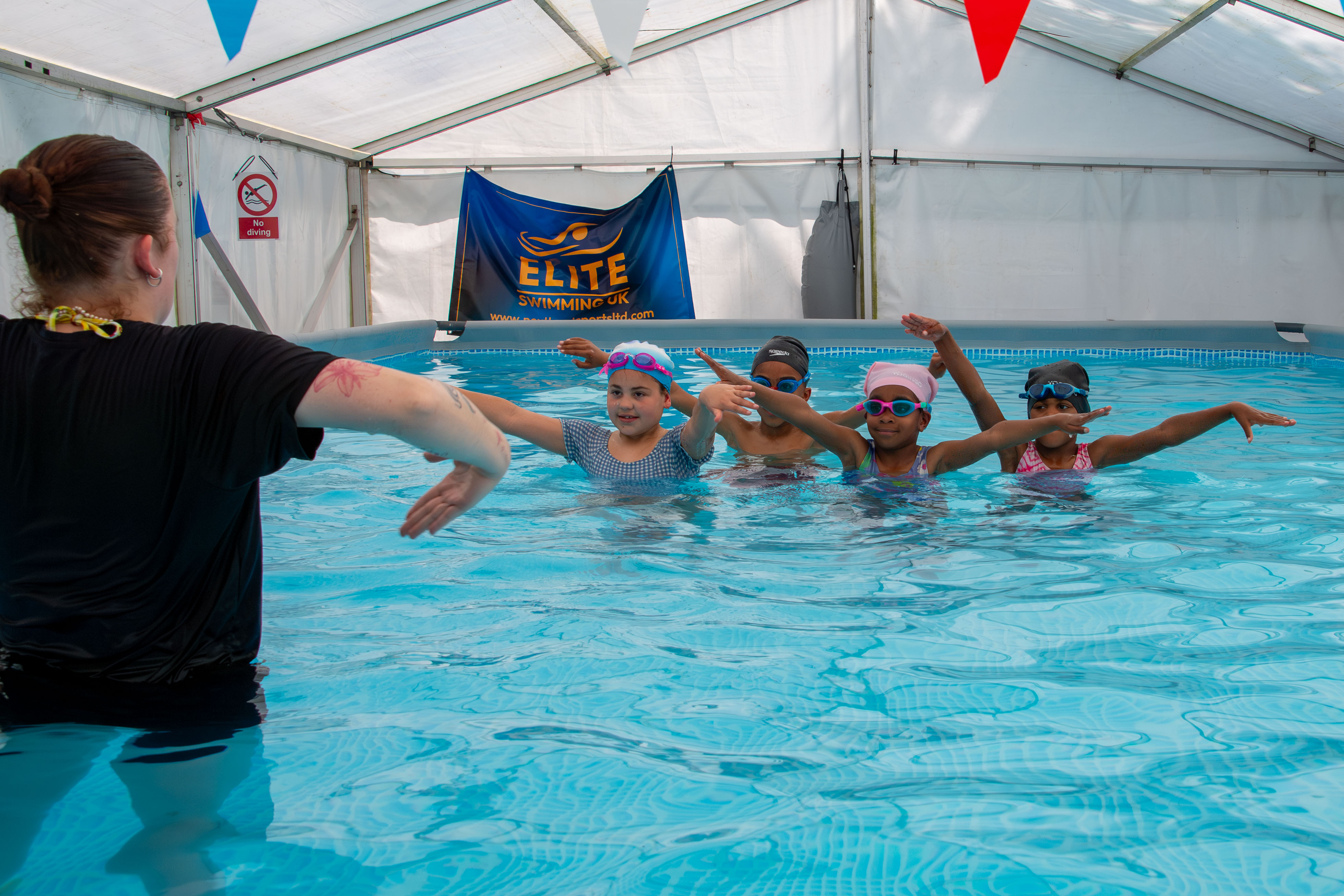 Burntstump pupils making a splash in their playground swimming pool