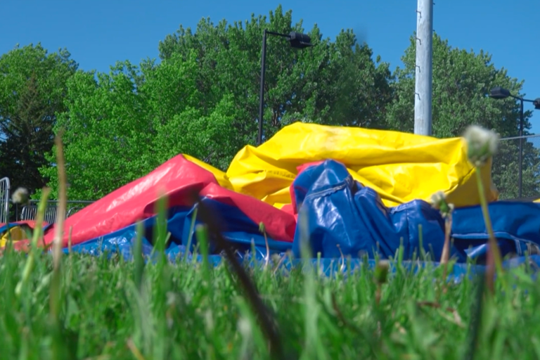 Toddler hospitalised after inflatable house thrown into air by storm