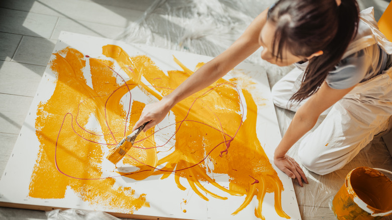 Skip the expensive wall decor: woman DIYs art pieces for under $100