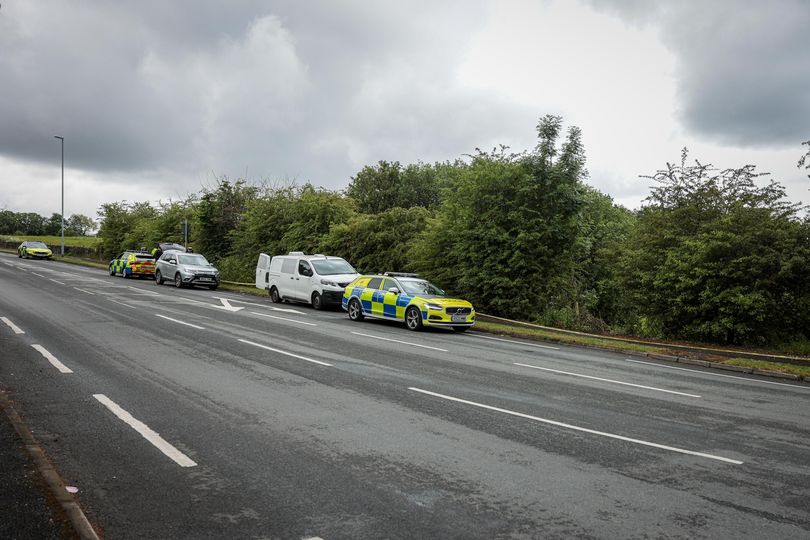 Oldham road shut off after car plunges down embankment with police at scene