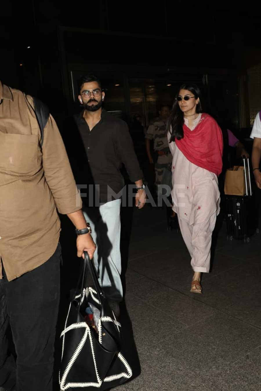 Photos: Virat Kohli and Anushka Sharma return to Mumbai after Vrindavan ...