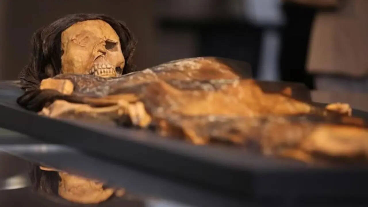 The woman buried with gold, tattoos and weapons may have been a ruler ...
