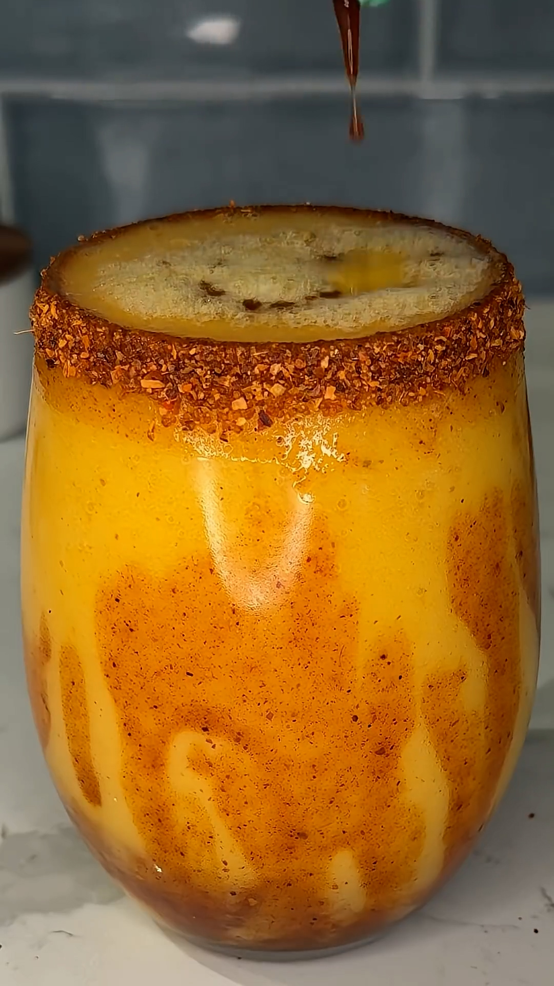 Tangy mango and chili come together in a frozen Mexican mangonada