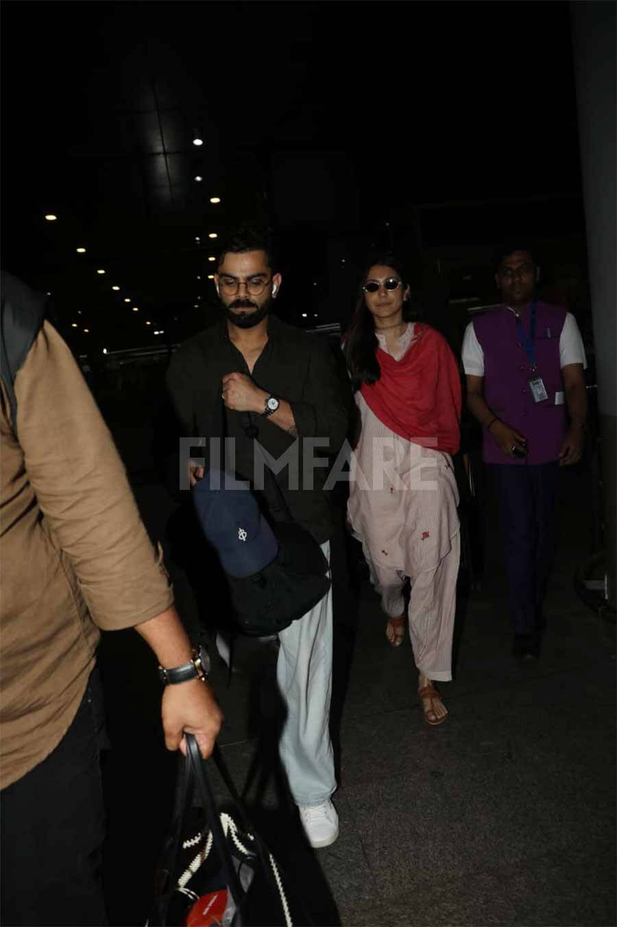 Photos: Virat Kohli and Anushka Sharma return to Mumbai after Vrindavan ...