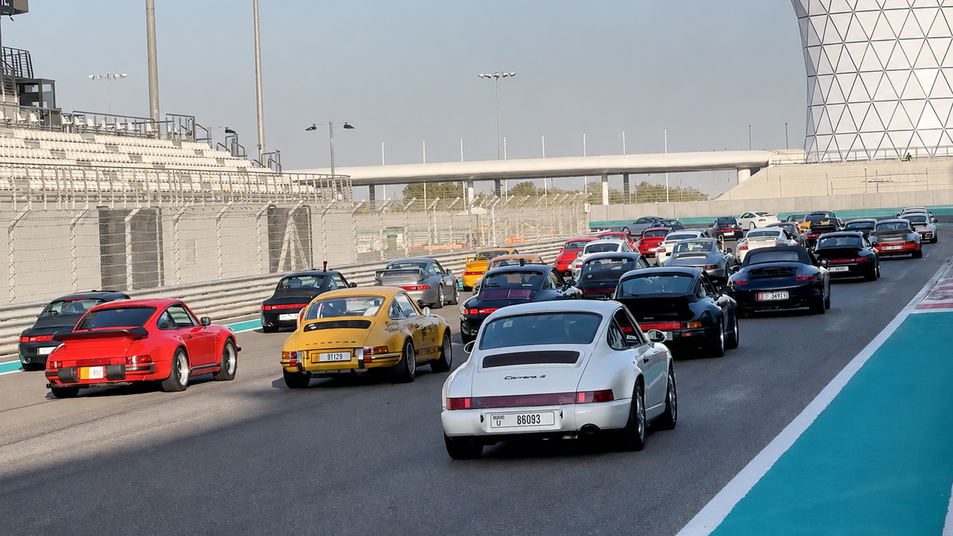 Millionaires taking classic Porsche 911s around Dubai circuit