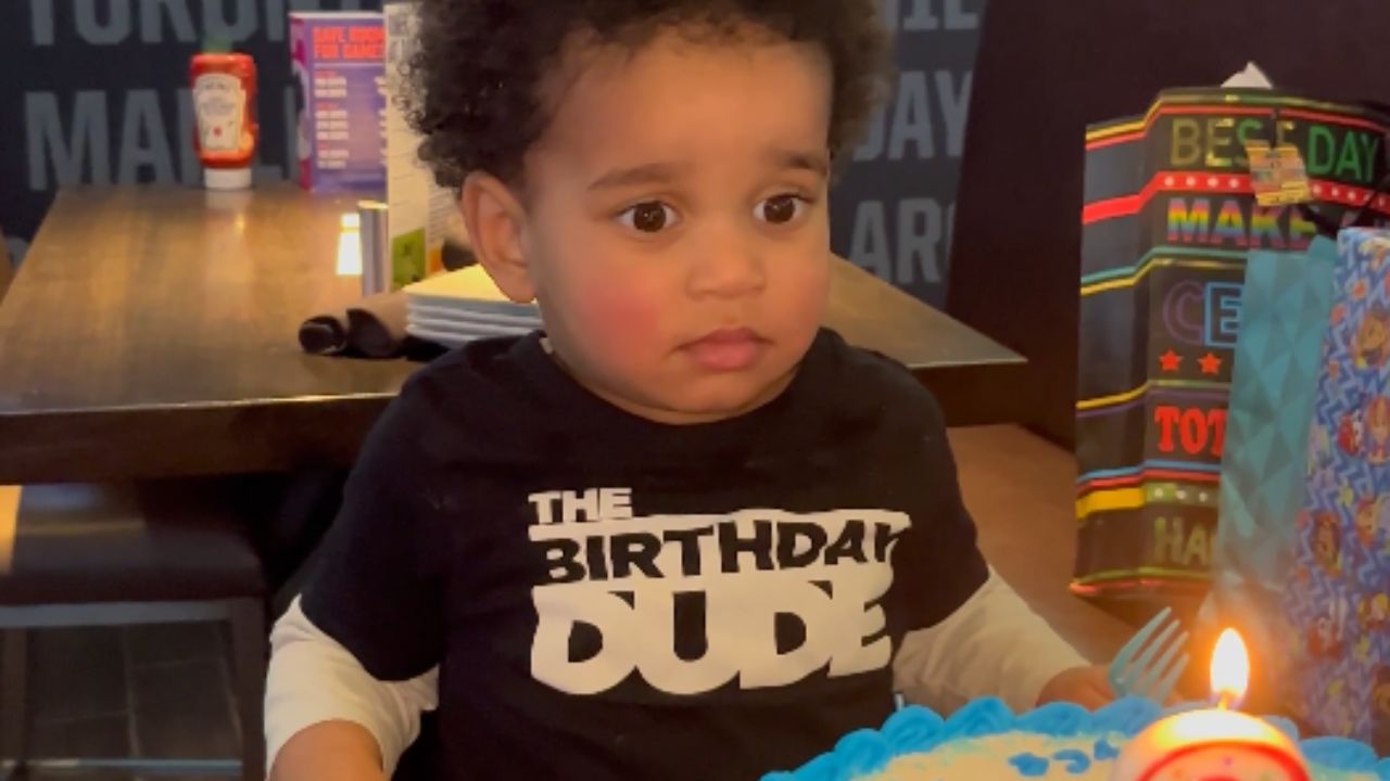 Captivated by her - young boy falls for waitress on his second birthday
