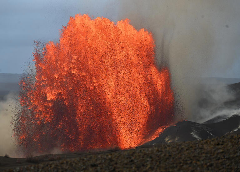 Tourists watch latest eruption as Hawaii’s Kilauea volcano sets lava record
