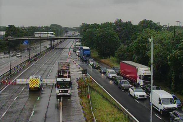 Man dies and woman fighting for life after crash involving police on M4