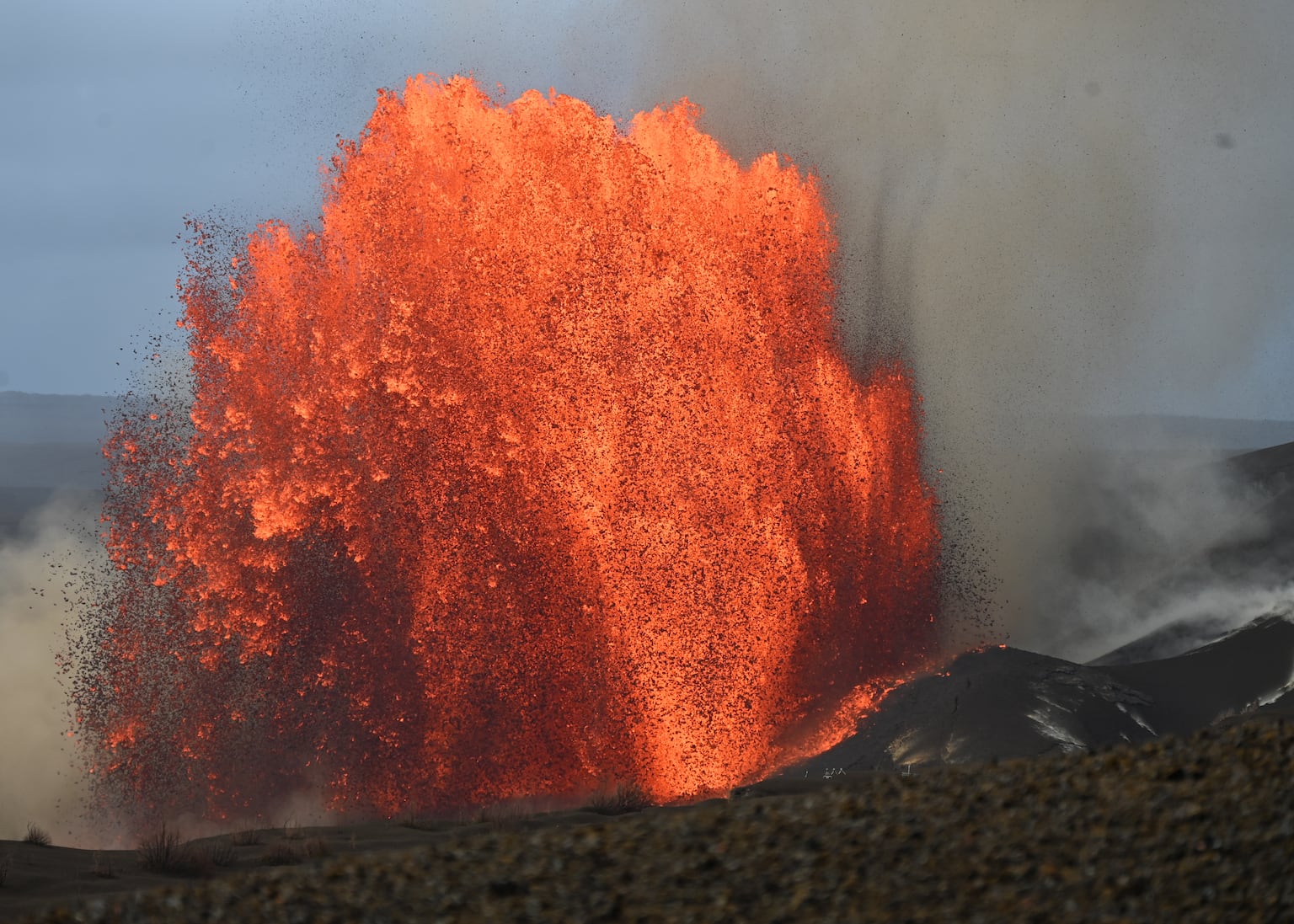 Tourists watch latest eruption as Hawaii’s Kilauea volcano sets lava record