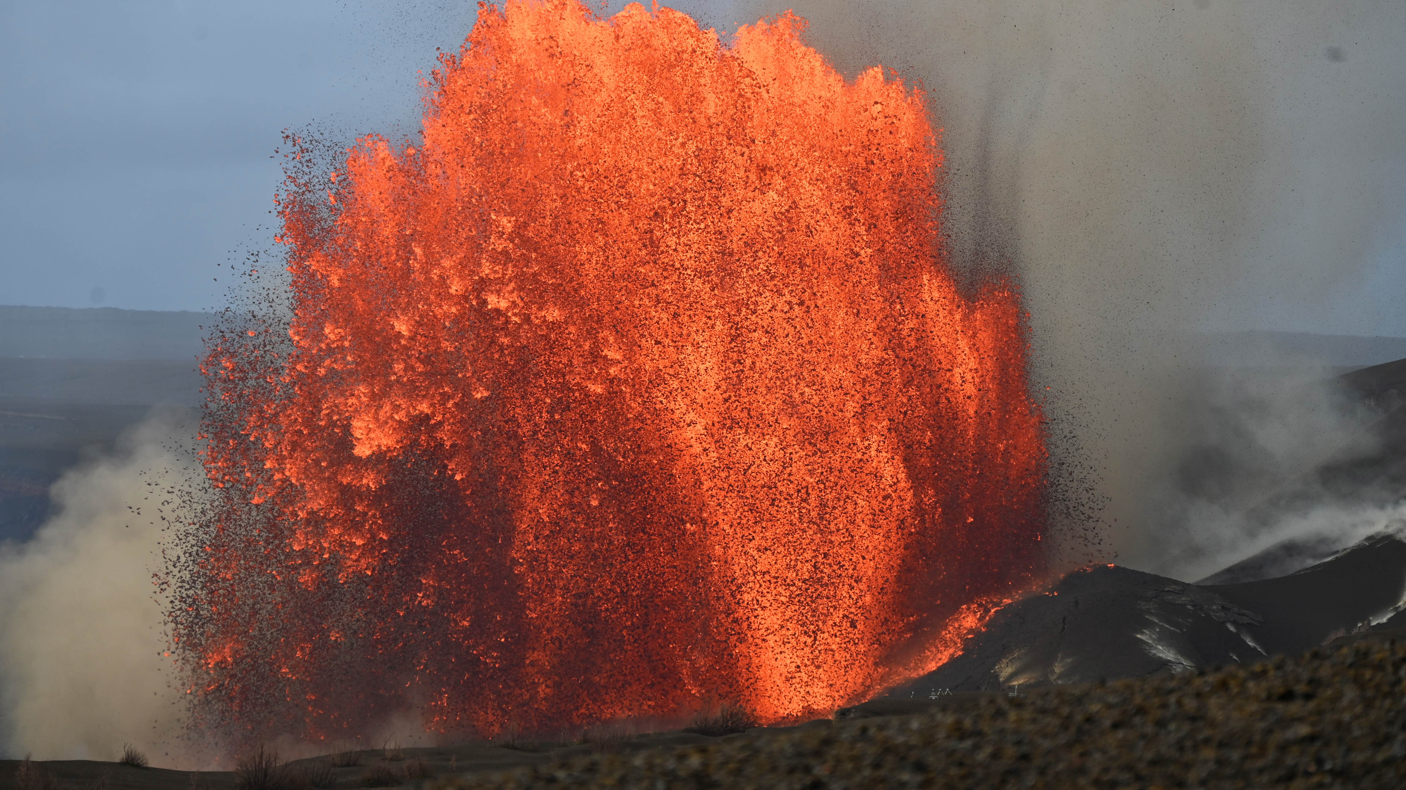 Tourists watch latest eruption as Hawaii’s Kilauea volcano sets lava record