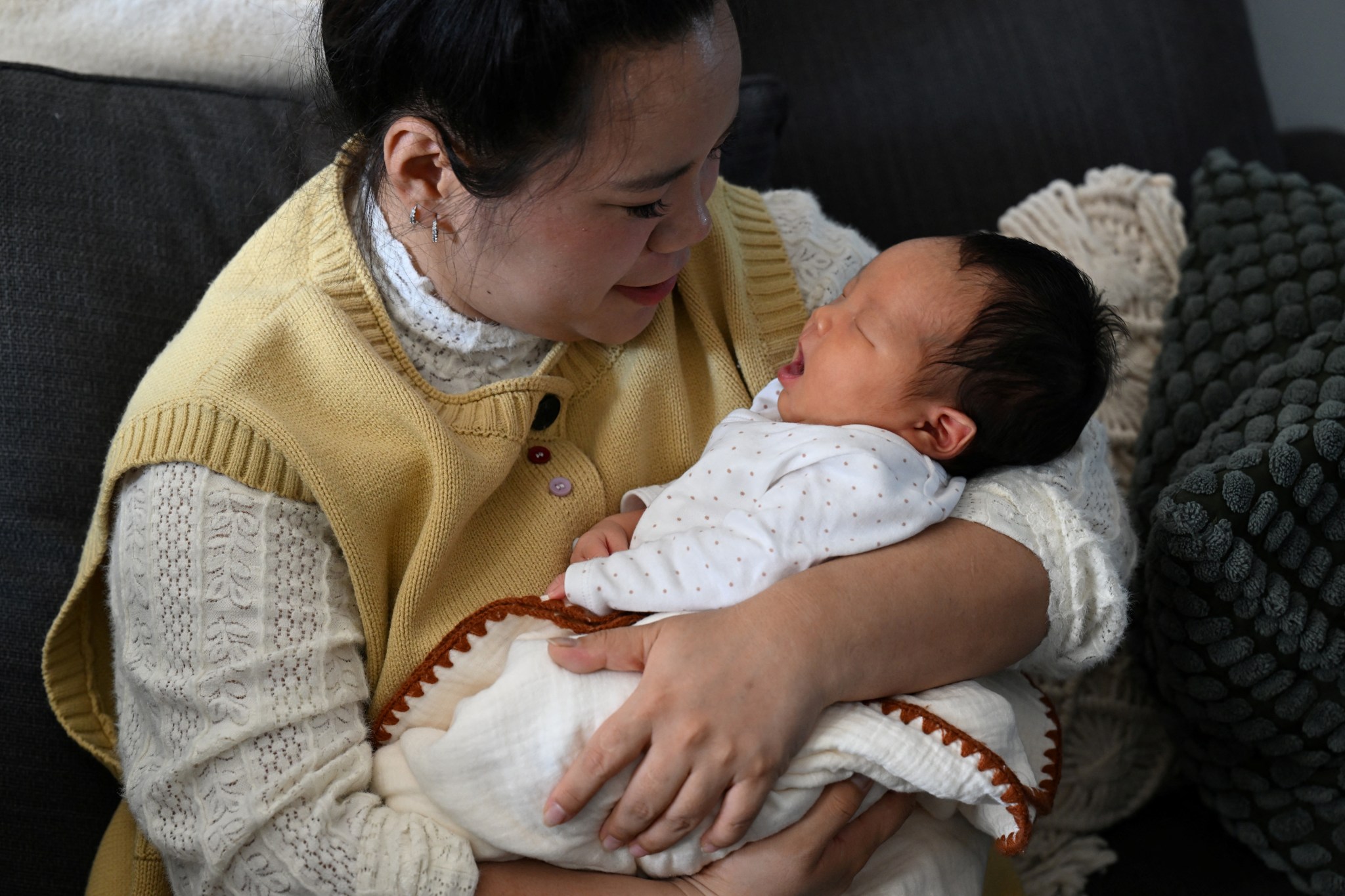 China raises childcare handouts to fight plummeting birth rate