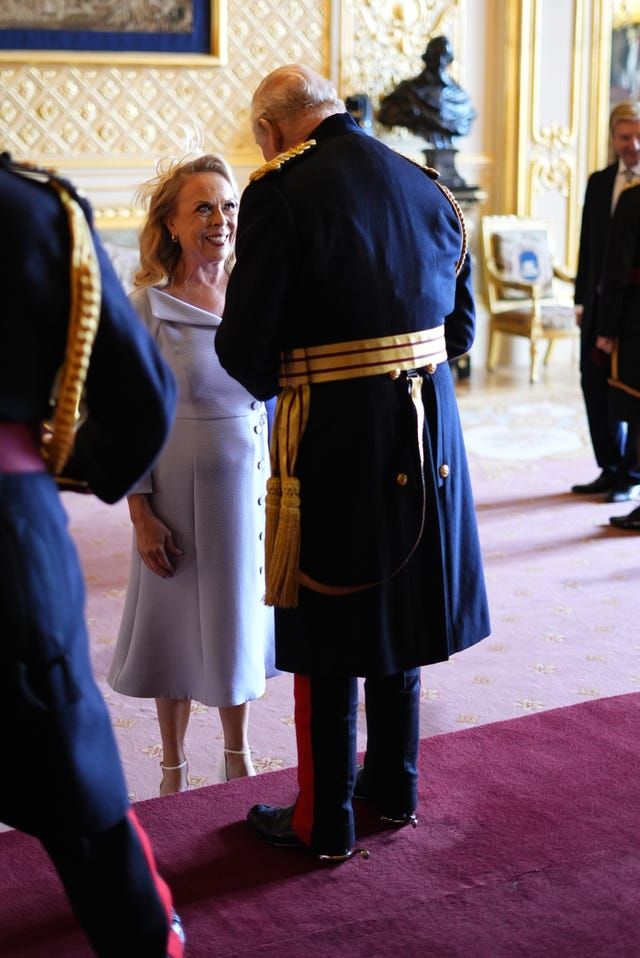 Torvill and Dean celebrate retirement with honours from King