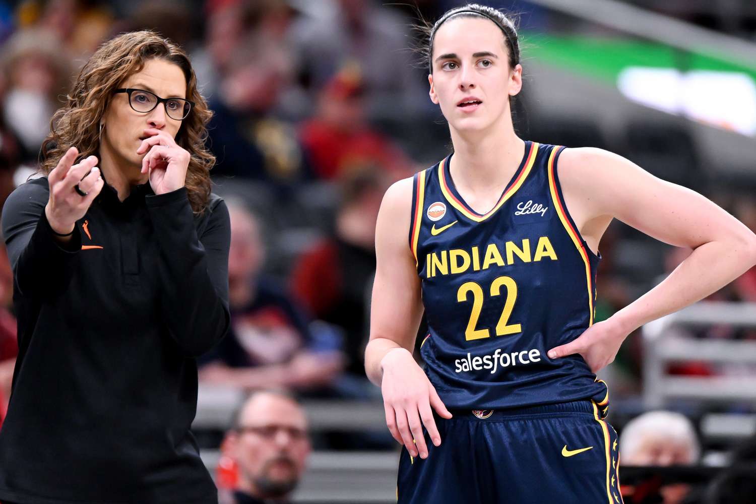 Caitlin Clark downplays sideline spat with coach Stephanie White ...